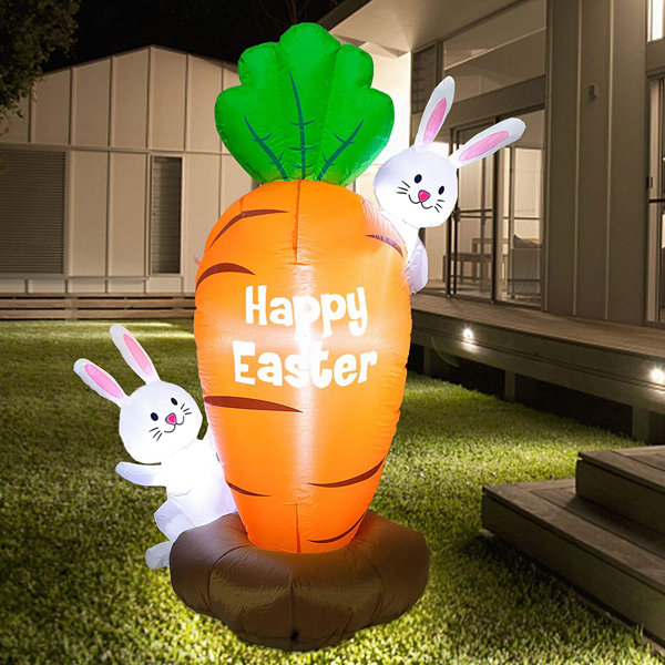 The Holiday Aisle® Easter Bunnies With Giant Carrot Inflatable | Wayfair