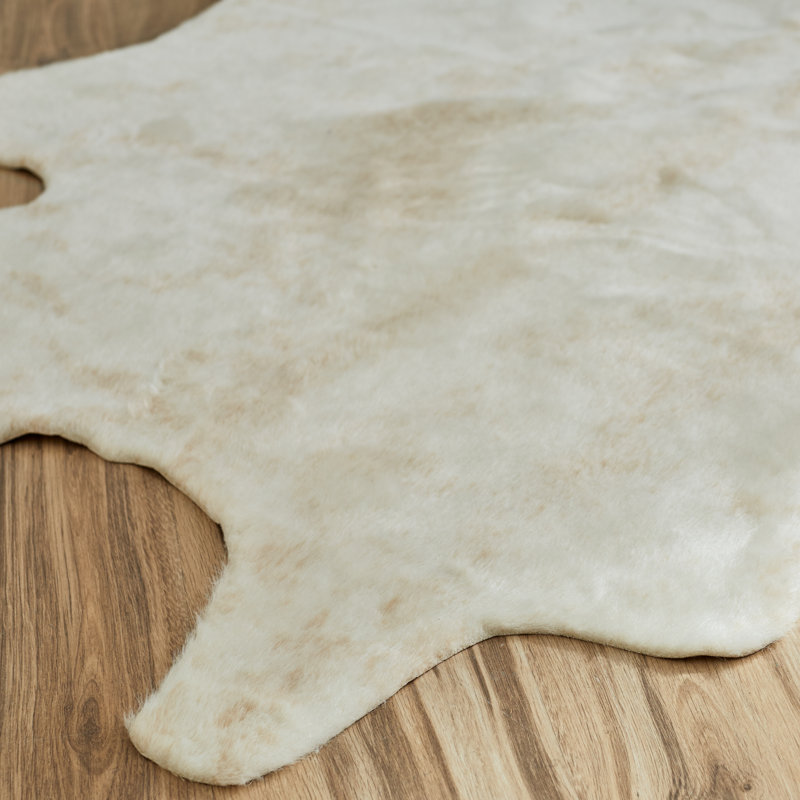 Mercury Row® Lilianna Faux Cowhide Ivory Rug & Reviews | Wayfair