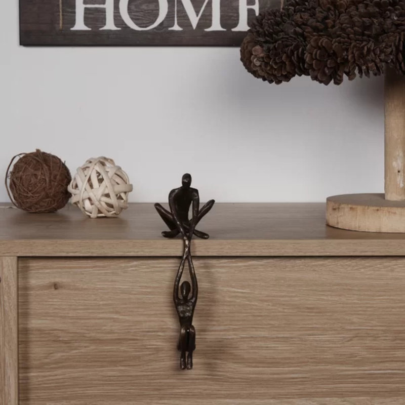 Wrought Studio™ Akyra Man Lifting Woman from Ledge Bronze Sculpture ...