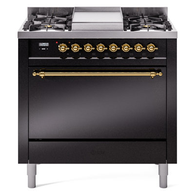 black oven with gold knobs