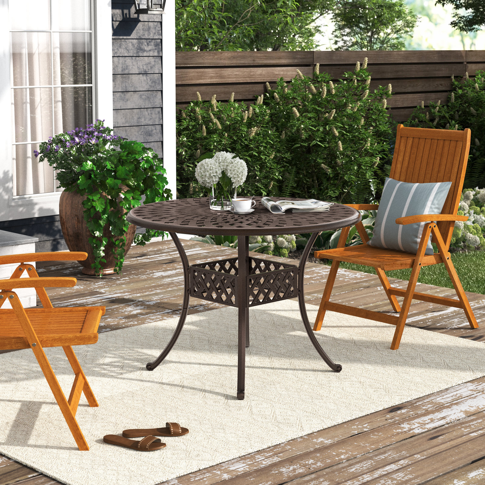 Three Posts™ Cotner Cast Aluminum Patio Furniture Outdoor Dining Table ...