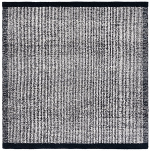 Latitude Run® Handmade Tufted Wool Ivory/Black Area Rug & Reviews | Wayfair