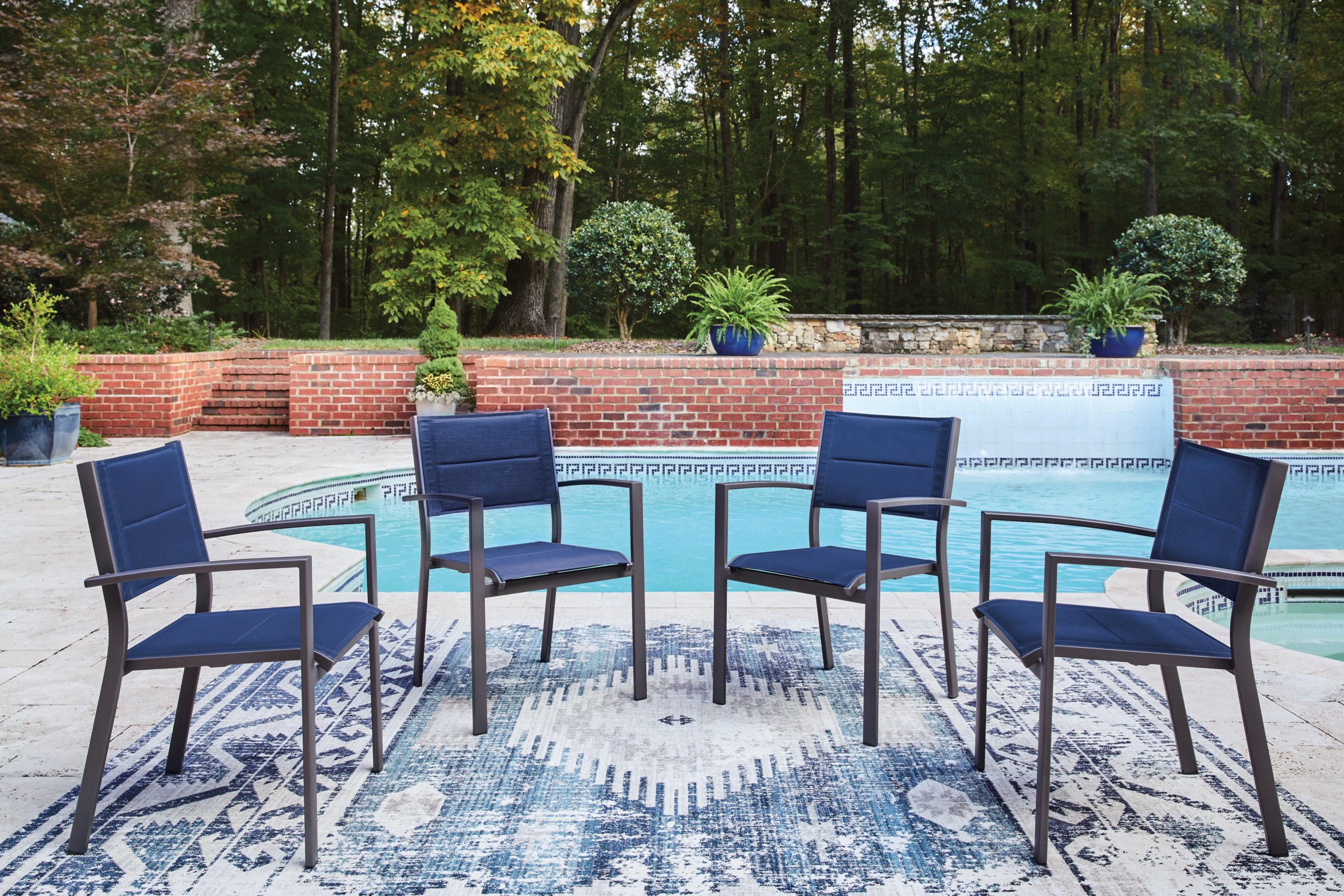 Beachcrest Home™ Carbonell Outdoor Sling Arm Chair (Set Of 4) | Wayfair