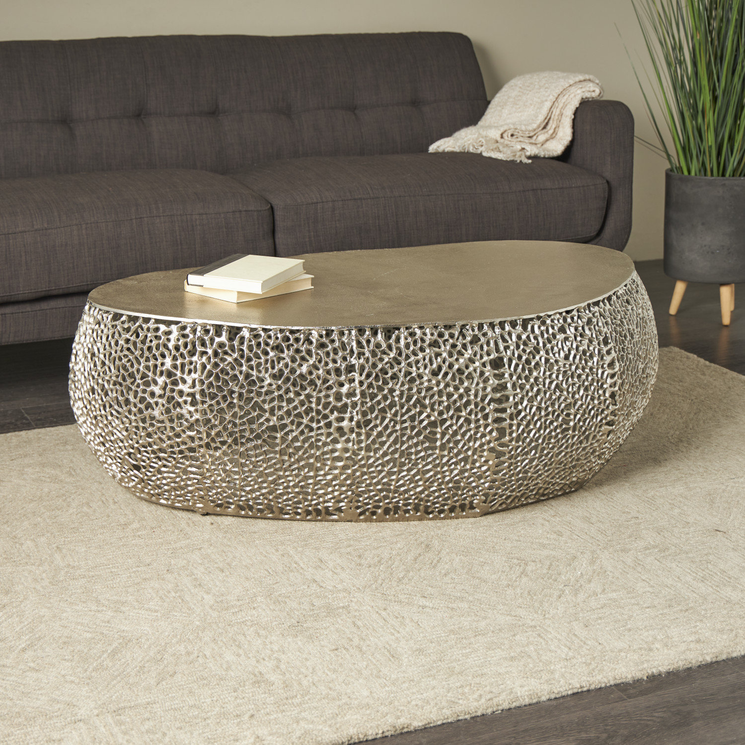 Wade Logan® Brannum Silver Aluminum Round Elongated Coffee Table ...