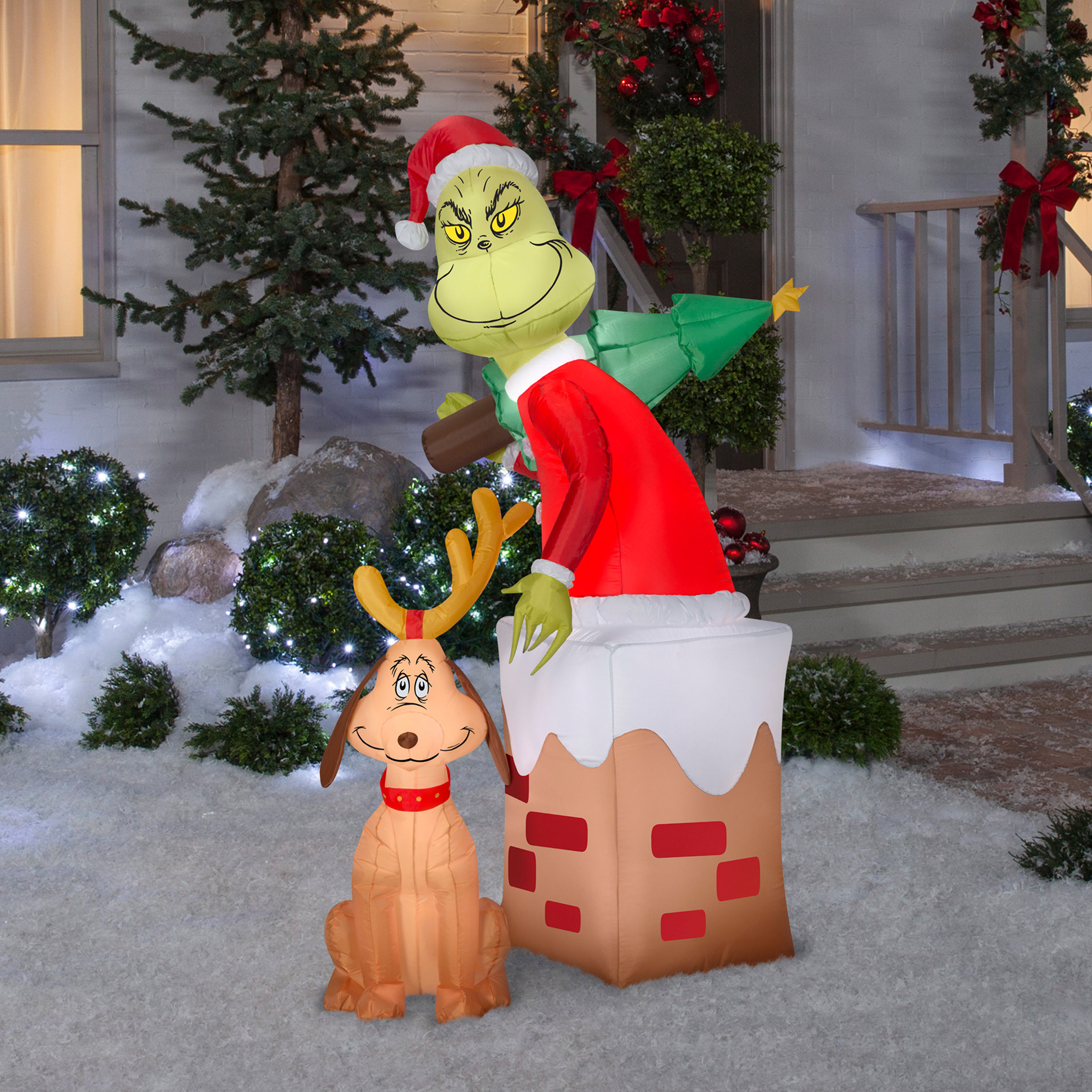 The Holiday Aisle® 5.5ft Inflatable Grinch in a Chimney with Max | Wayfair