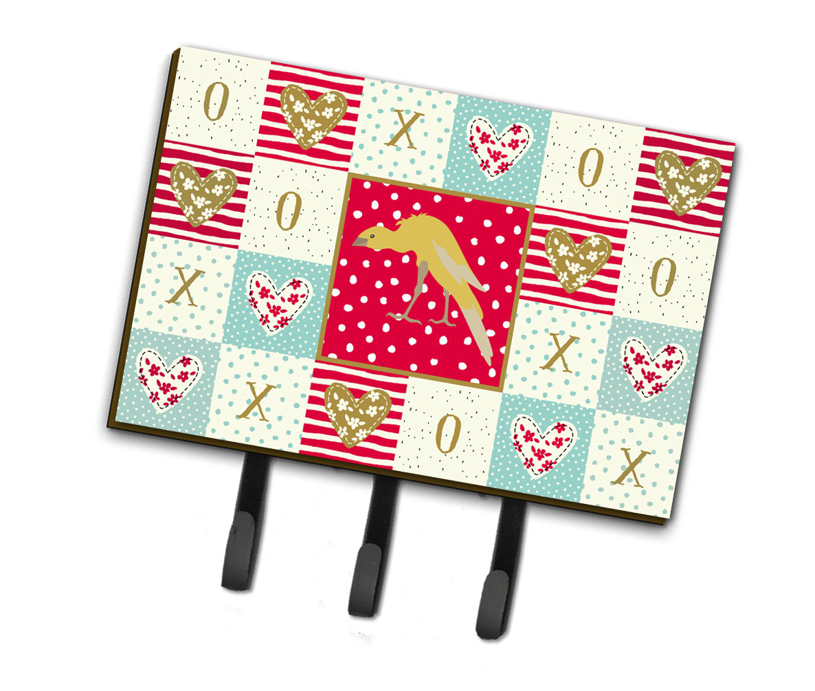 The Holiday Aisle® Tugrul Belgian Hunchback Canary Love Wall Key ...