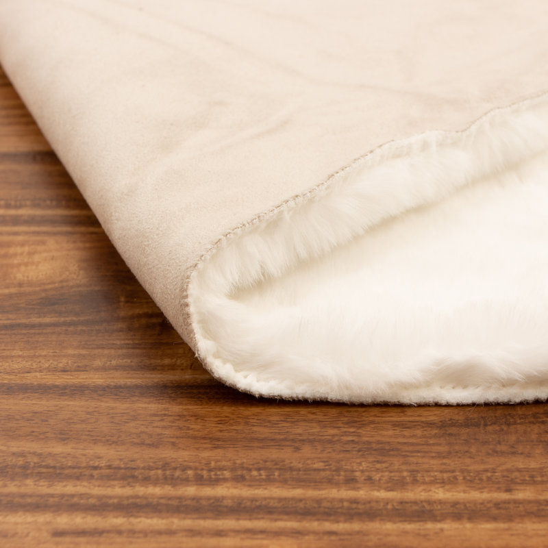 Ebern Designs Solera Faux Fur Solid Color Rug & Reviews | Wayfair