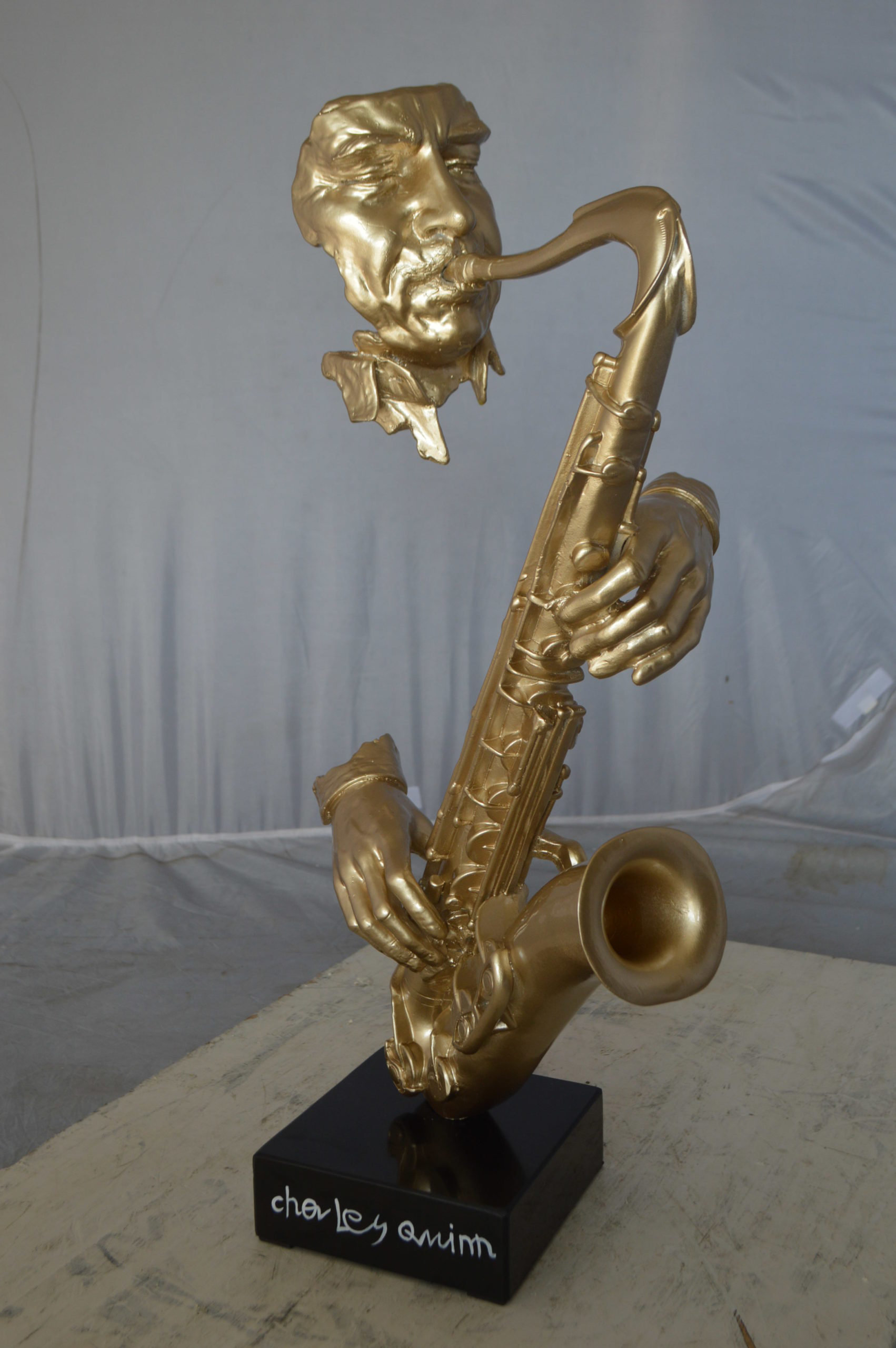 Wildon Home® Warlo a saxophone player resin statue - Size: 13"L x 5"W x ...