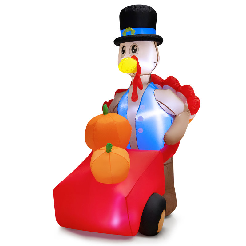 The Holiday Aisle® Turkey Pushing Pumpkin Cart Inflatable | Wayfair