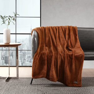 Kenneth Cole Faux Fur Solid Throw Blankets & Reviews | Wayfair