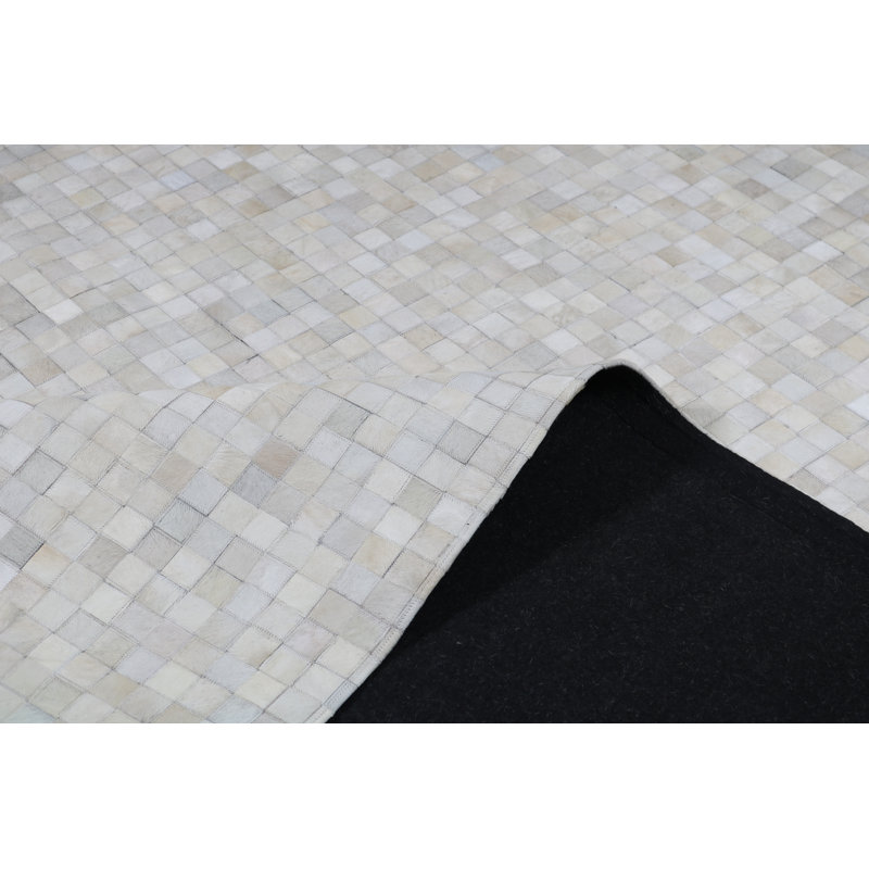 Orren Ellis Meer Patchwork Handmade Cow Skin Ivory Area Rug | Wayfair