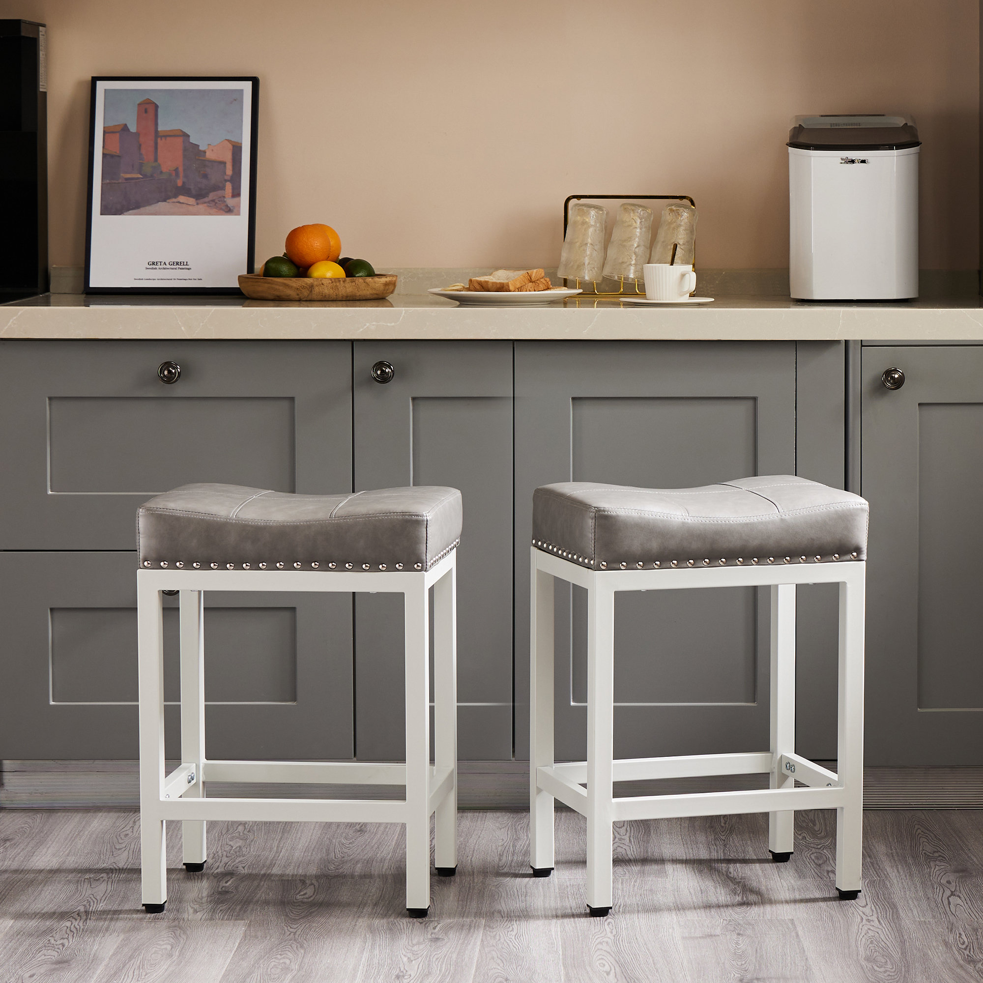 Winston Porter Michille Saddle Upholstered 24.21" Counter Stool ...