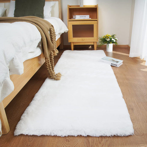 Mercer41 Fidenzia Solid Color Machine Woven Faux Fur Area Rug in White ...