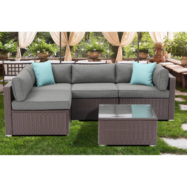 Orren Ellis Ahull 5 Piece Rattan Sectional Seating Group with Cushions ...