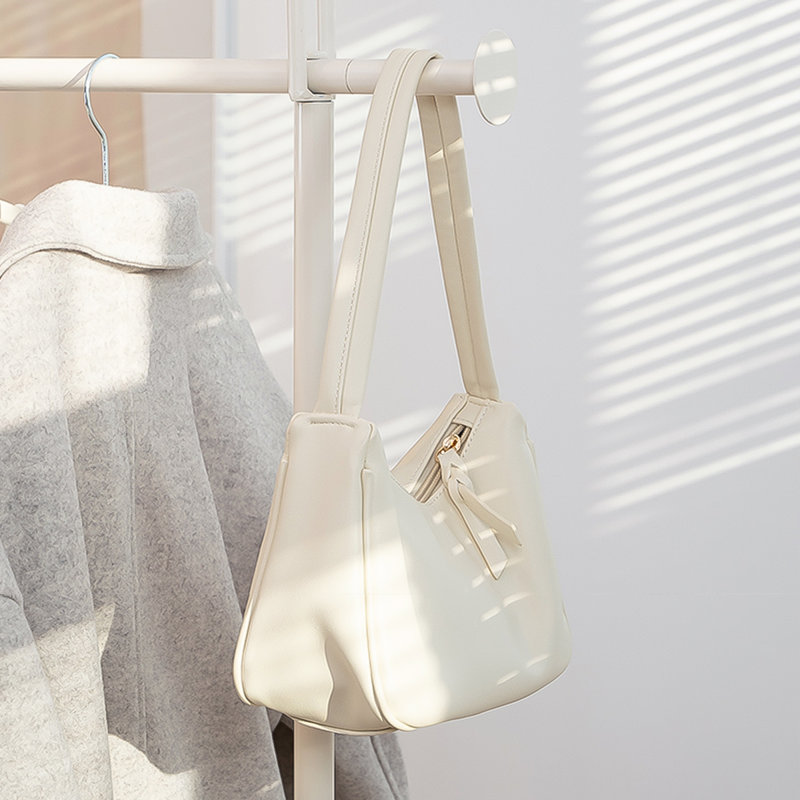 Rebrilliant Niaimani 31.5'' Metal+Leather Rolling Clothes Racks ...