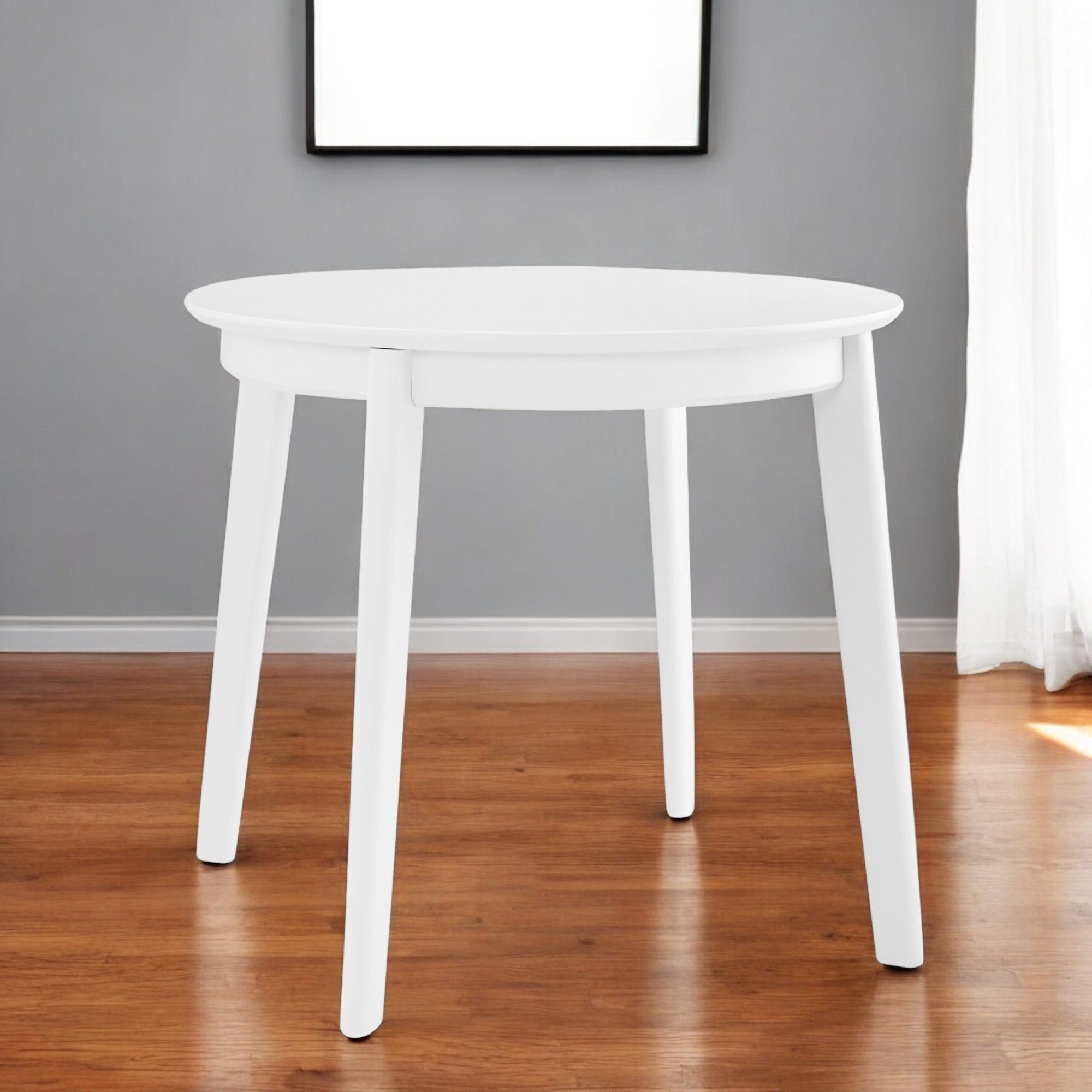HomeRoots 36" White Wood Round Top Dining Table - Wayfair Canada