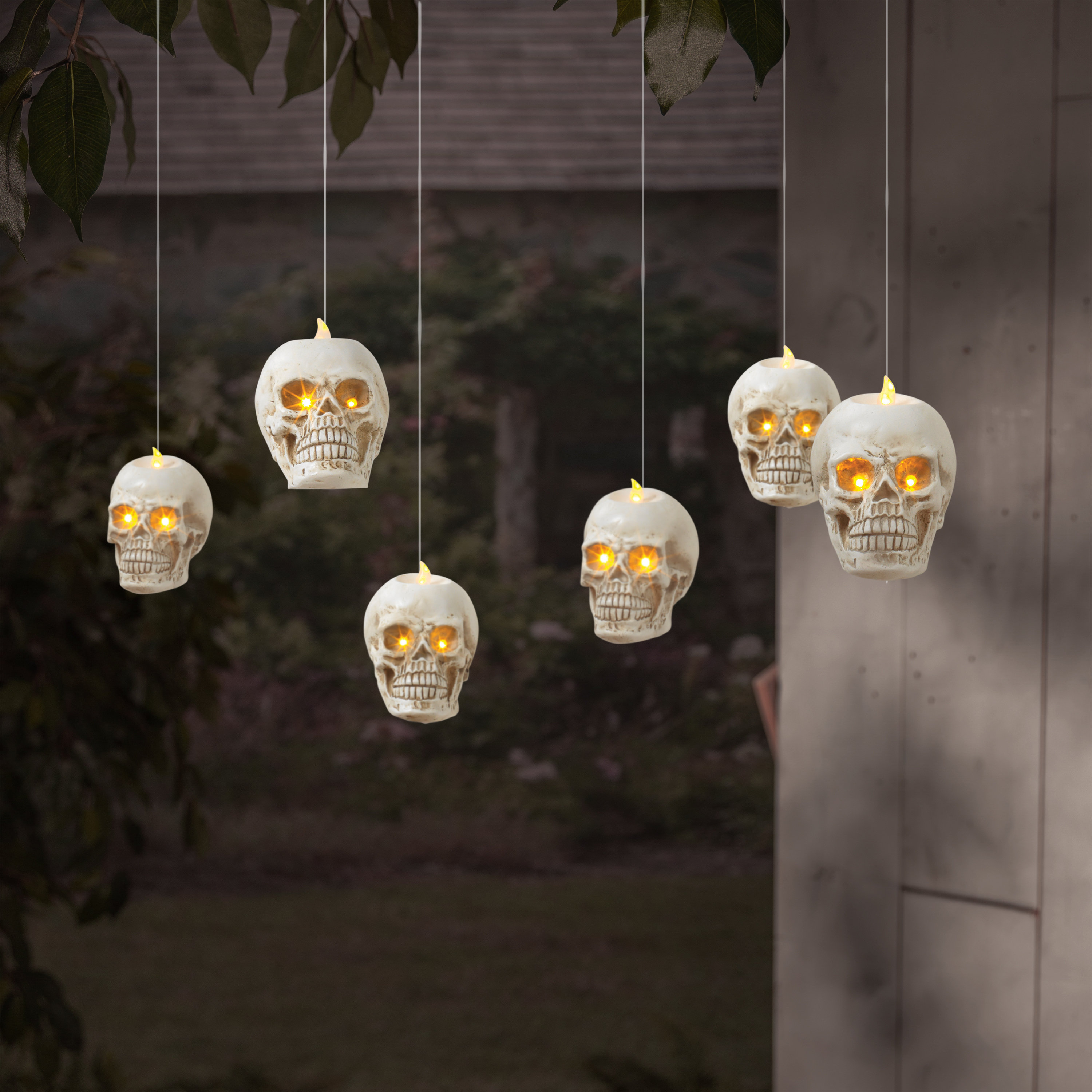 The Holiday Aisle® Set Of 4 Battery Operated Resin Hanging Skull Appear ...