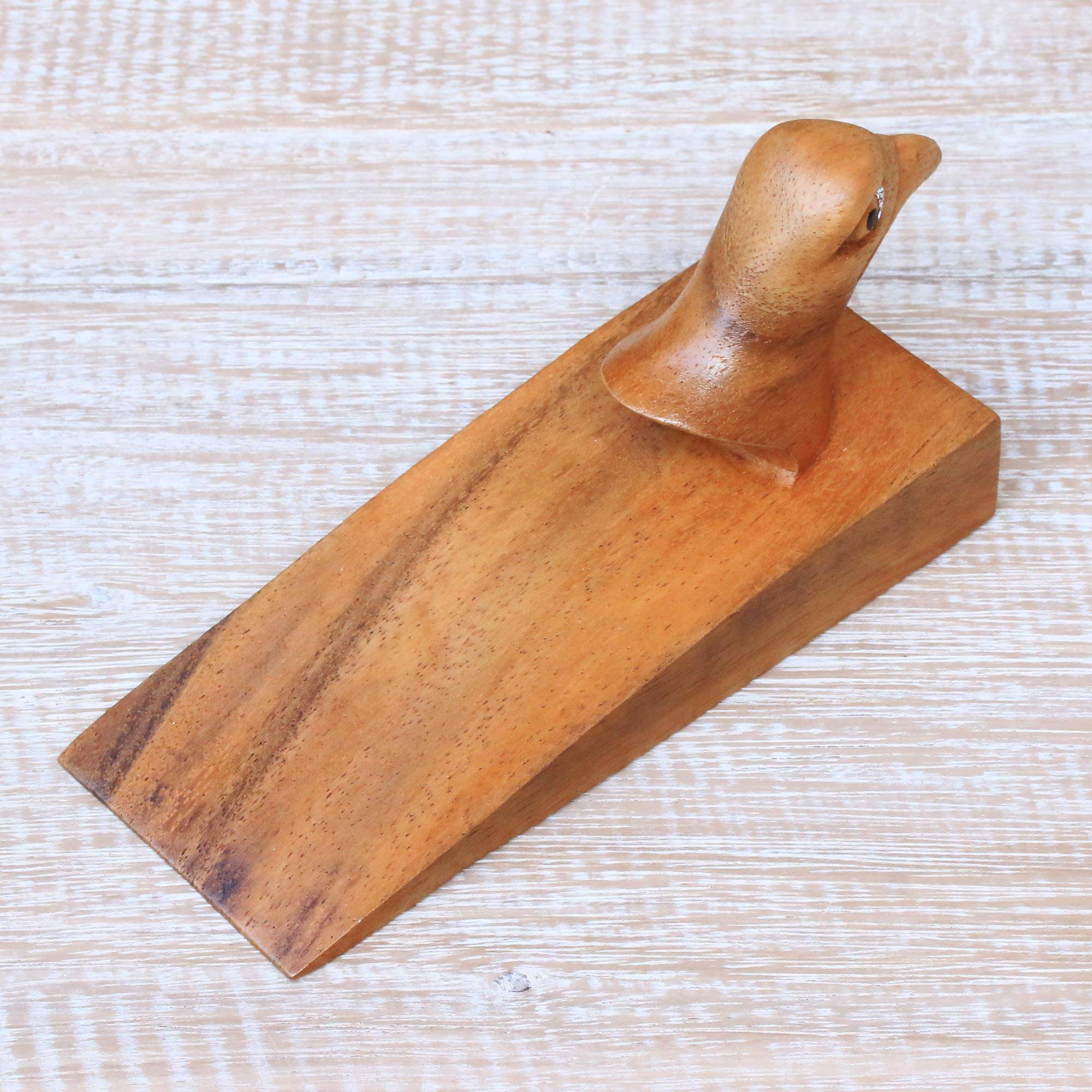 World Menagerie Nokota Eagle Eye Wood Wedge Floor Stop | Wayfair