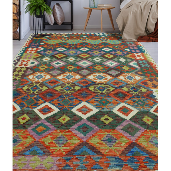 Isabelline Flatweave Orvyn Green Rug | Wayfair