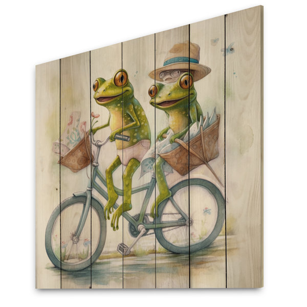 Trinx Green Frogs Riding A Bike On Wood Print | Wayfair