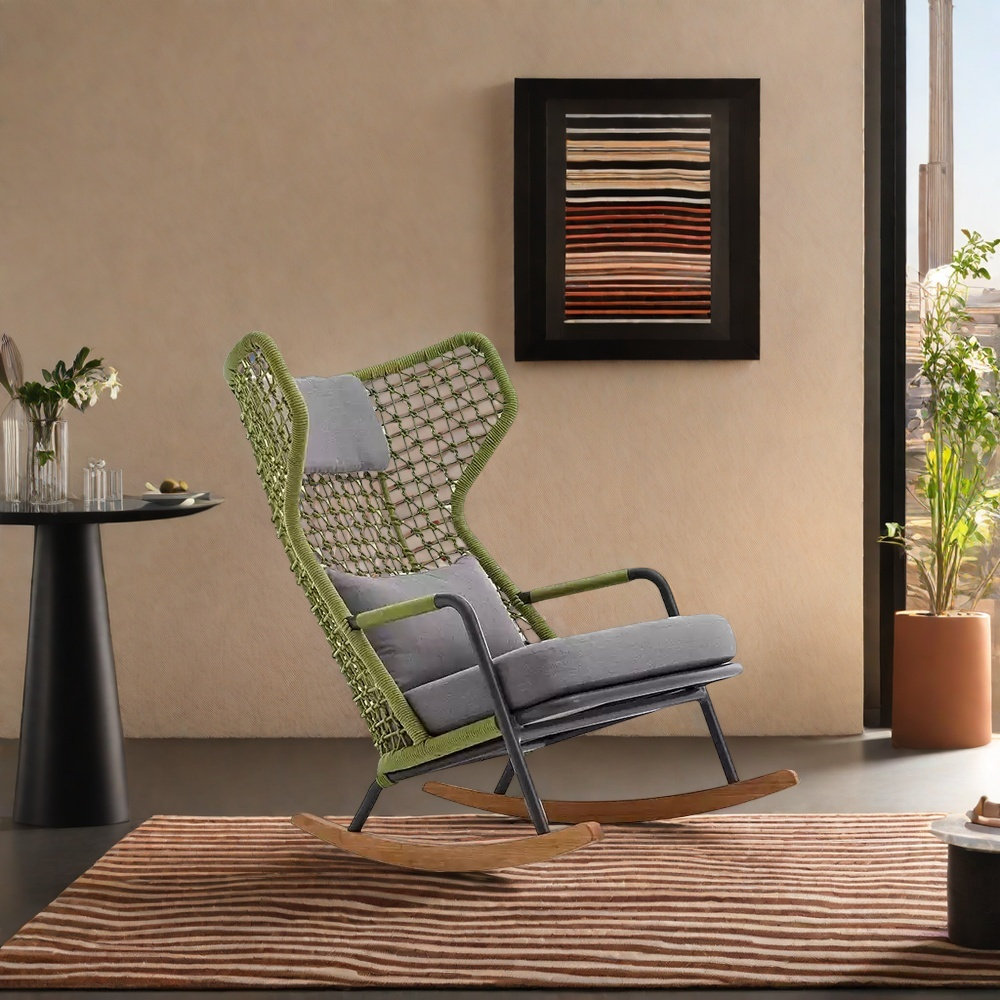 Elegant Home Furnishings.s Hand-woven teak rocker in the shape of a ...