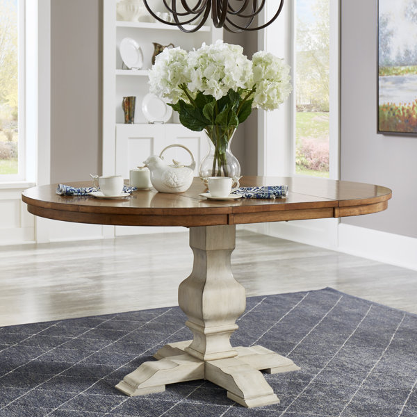 Three Posts™ Fortville Extendable Oval Solid Wood Dining Table ...
