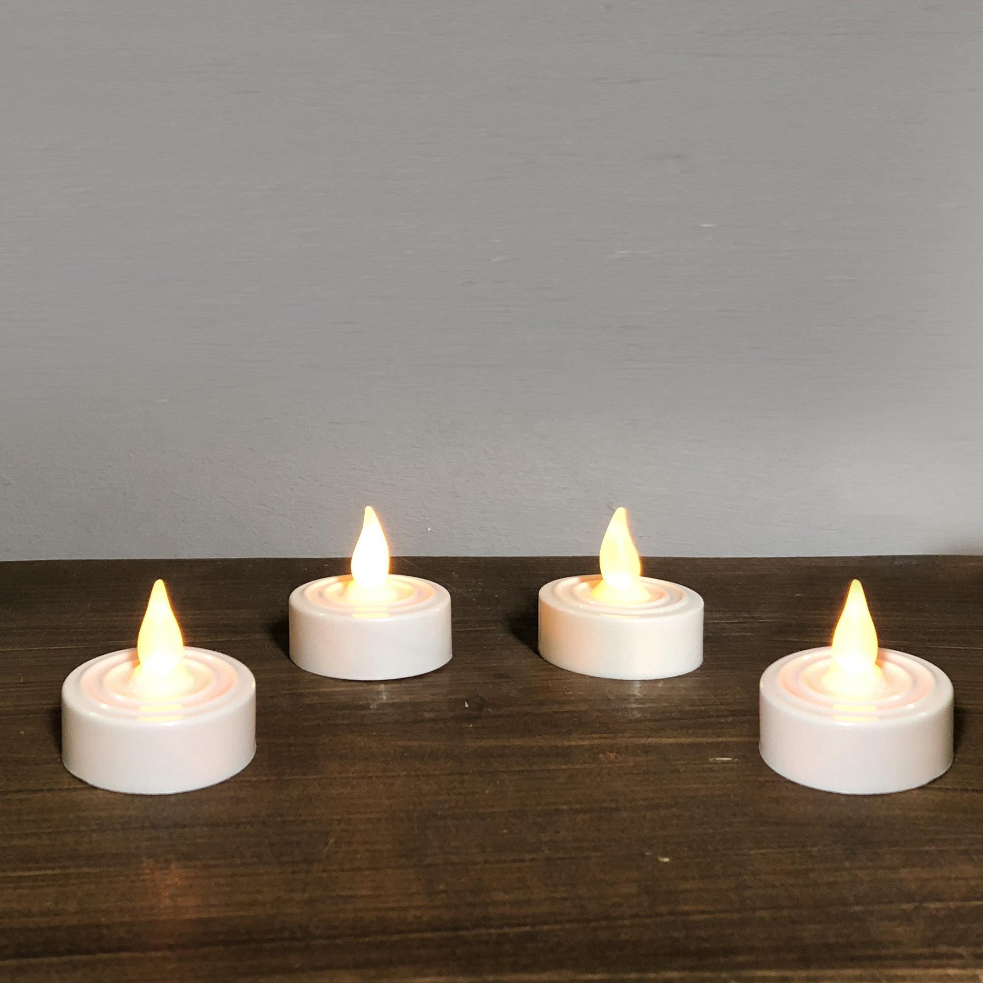 The Holiday Aisle® 4 Ct LED White Tea Lights | Wayfair