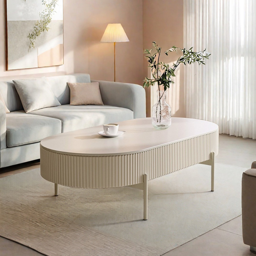 The Invincibles home Cream Style Oval Marble Coffee Table | Wayfair