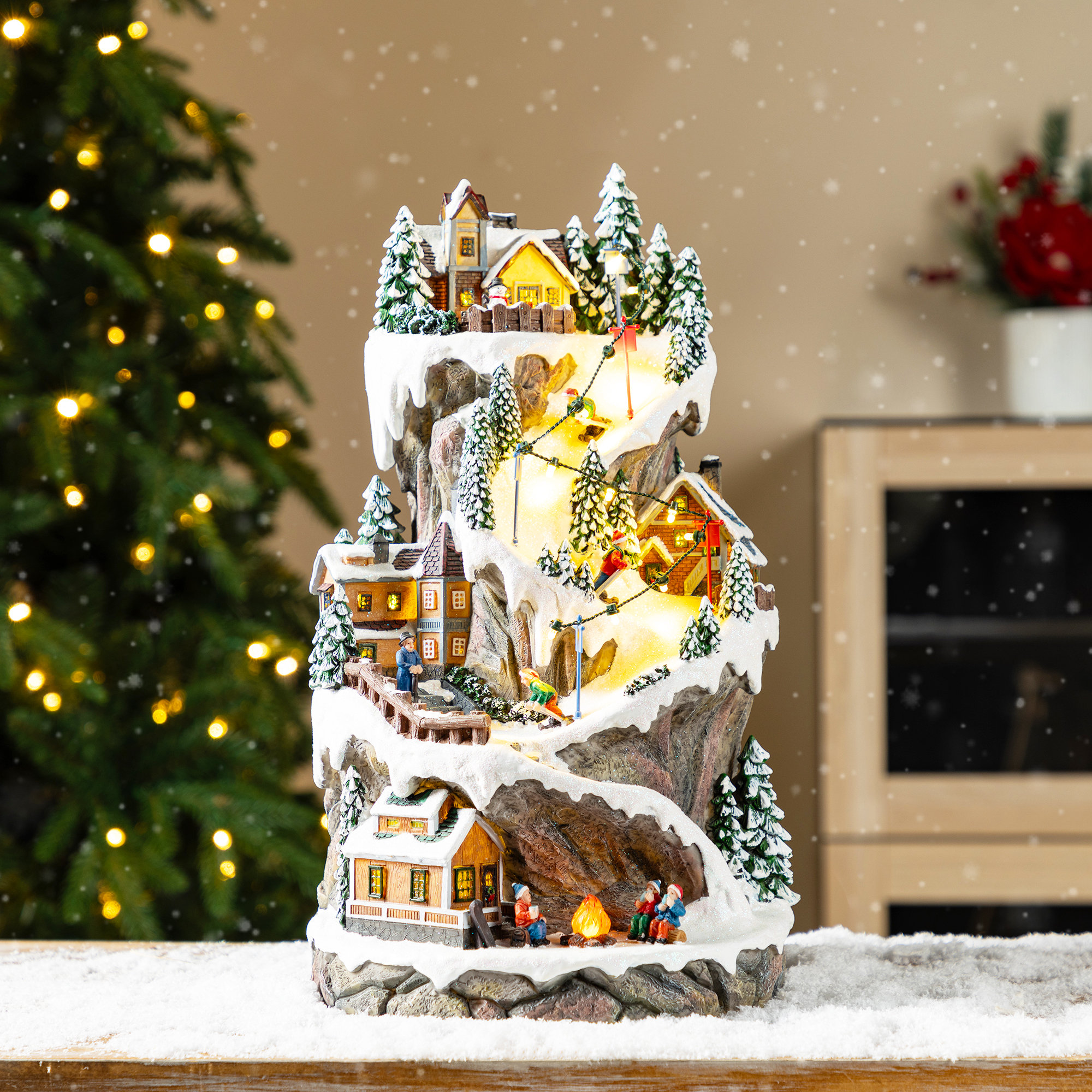 The Holiday Aisle® 15.5" Lighted Musical Christmas Skiing Village Scene ...