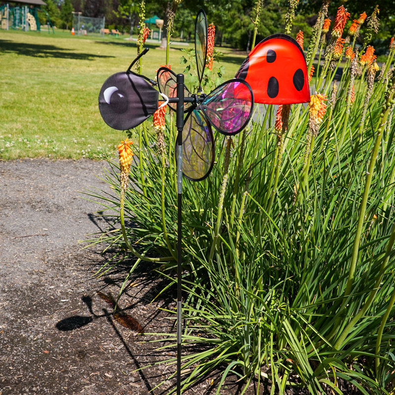 In The Breeze Pivoting Ladybug Spinner | Wayfair