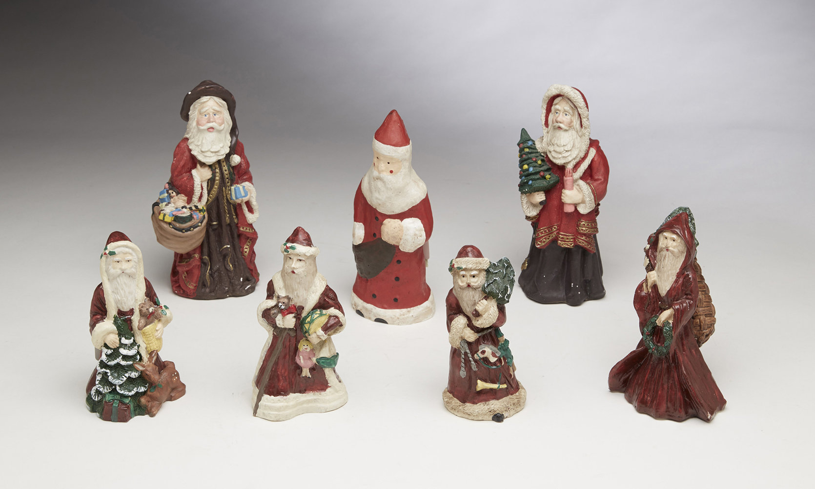 The Holiday Aisle® 7 Piece Santas Figurine Set - Wayfair Canada