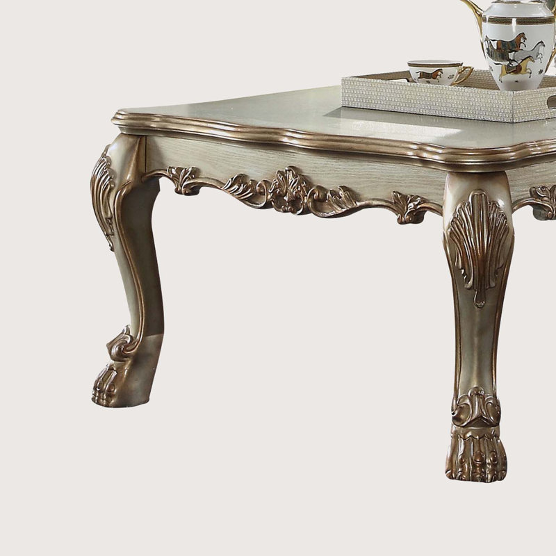Rosdorf Park Gold Patina And Bone Coffee Table With Claw Leg | Wayfair
