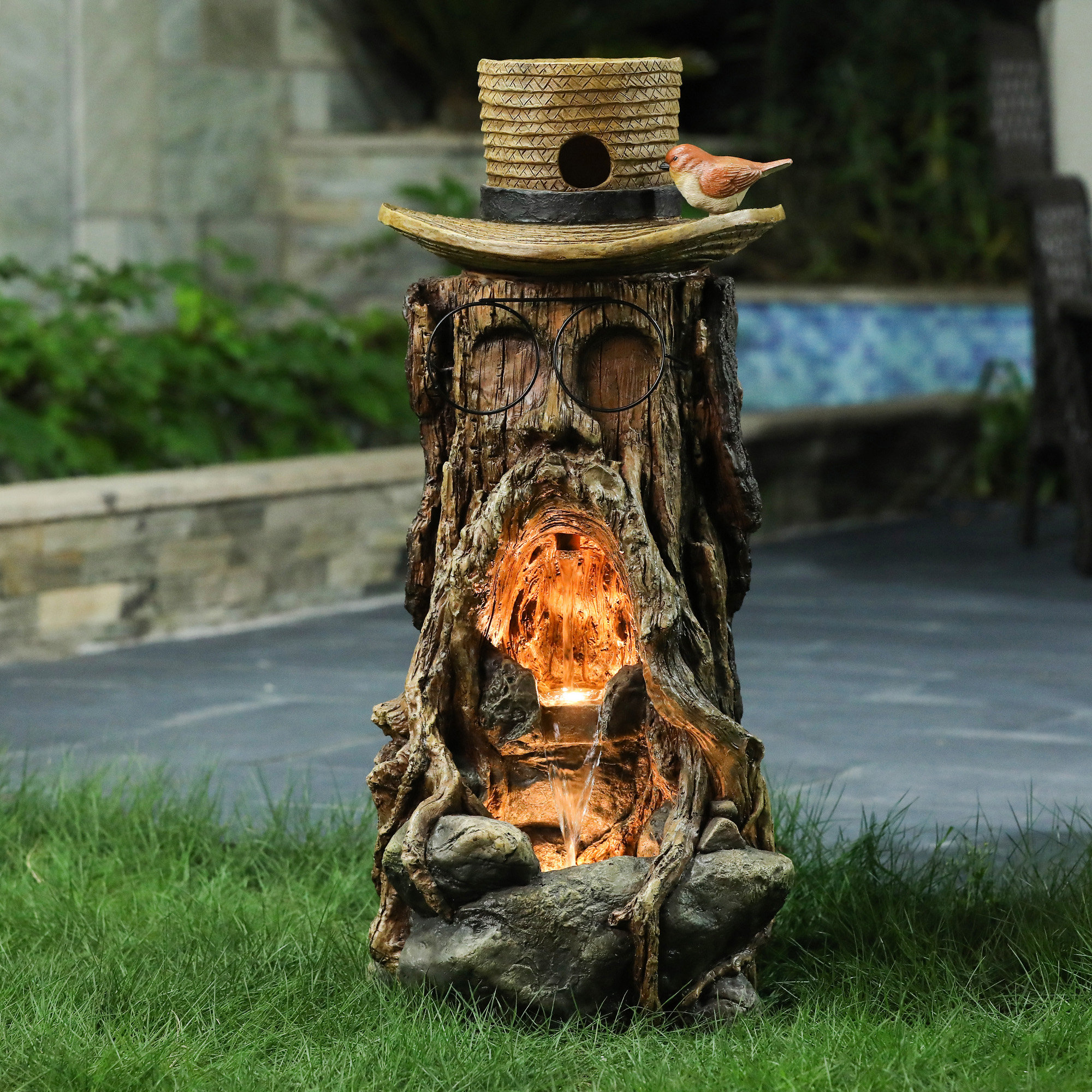Trinx Resin Tree Stump Face Fountain with Light and Bird House | Wayfair
