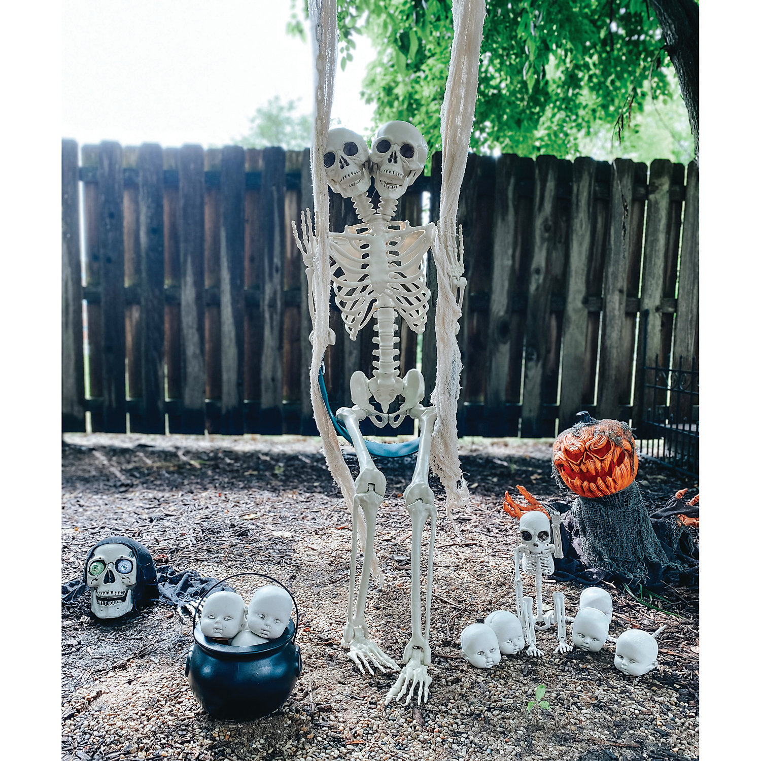 The Holiday Aisle® Two-Headed Life-Size Posable Skeleton Halloween ...