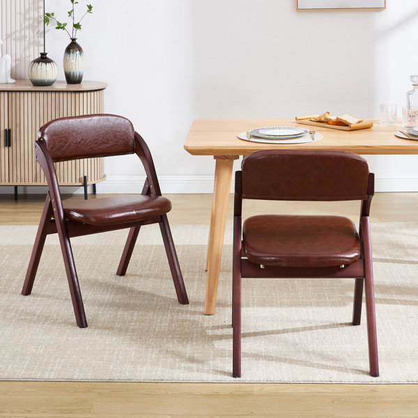 Corrigan Studio® Upholstered Padded Stackable Folding Chair | Wayfair