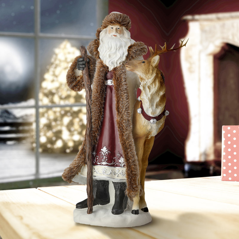 The Holiday Aisle® 15" Resin Regents Park Santa With Deer | Wayfair