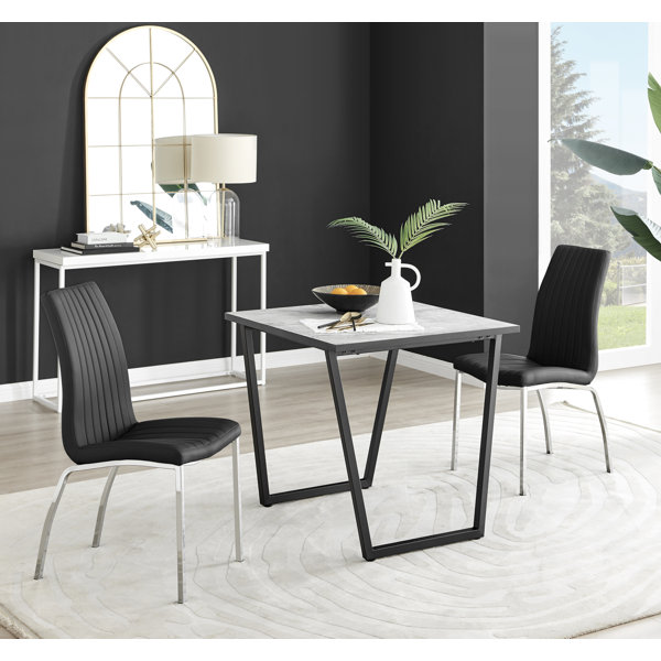 East Urban Home Carzon Marble Effect Melamine Dining Table and Chairs ...