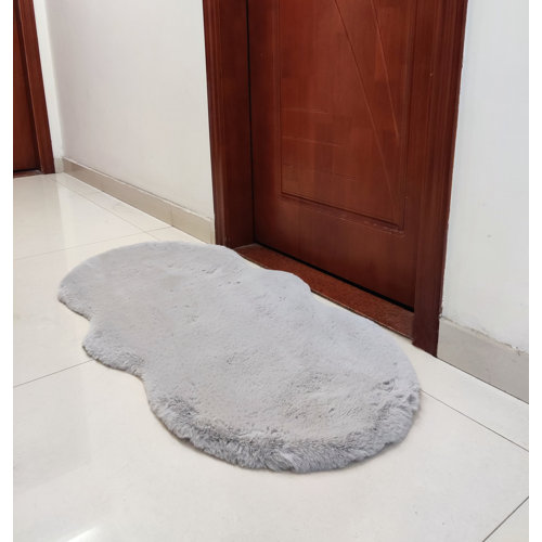 Mercer41 Khyrie Solid Color Machine Woven Shag Faux Fur Area Rug in ...