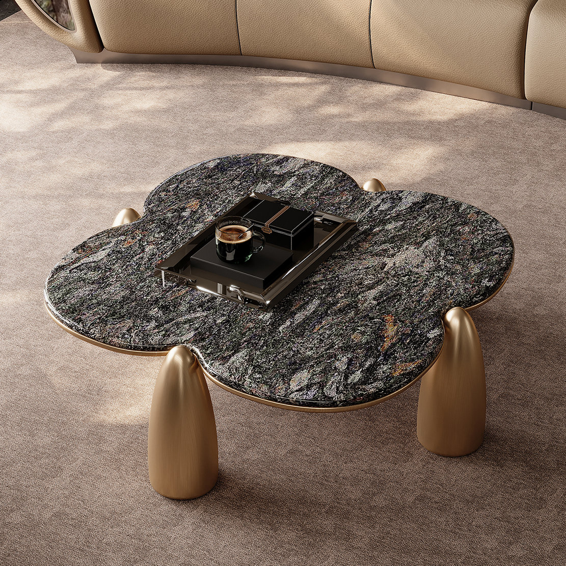 Everly Quinn This elegant clover-shaped coffee table | Wayfair
