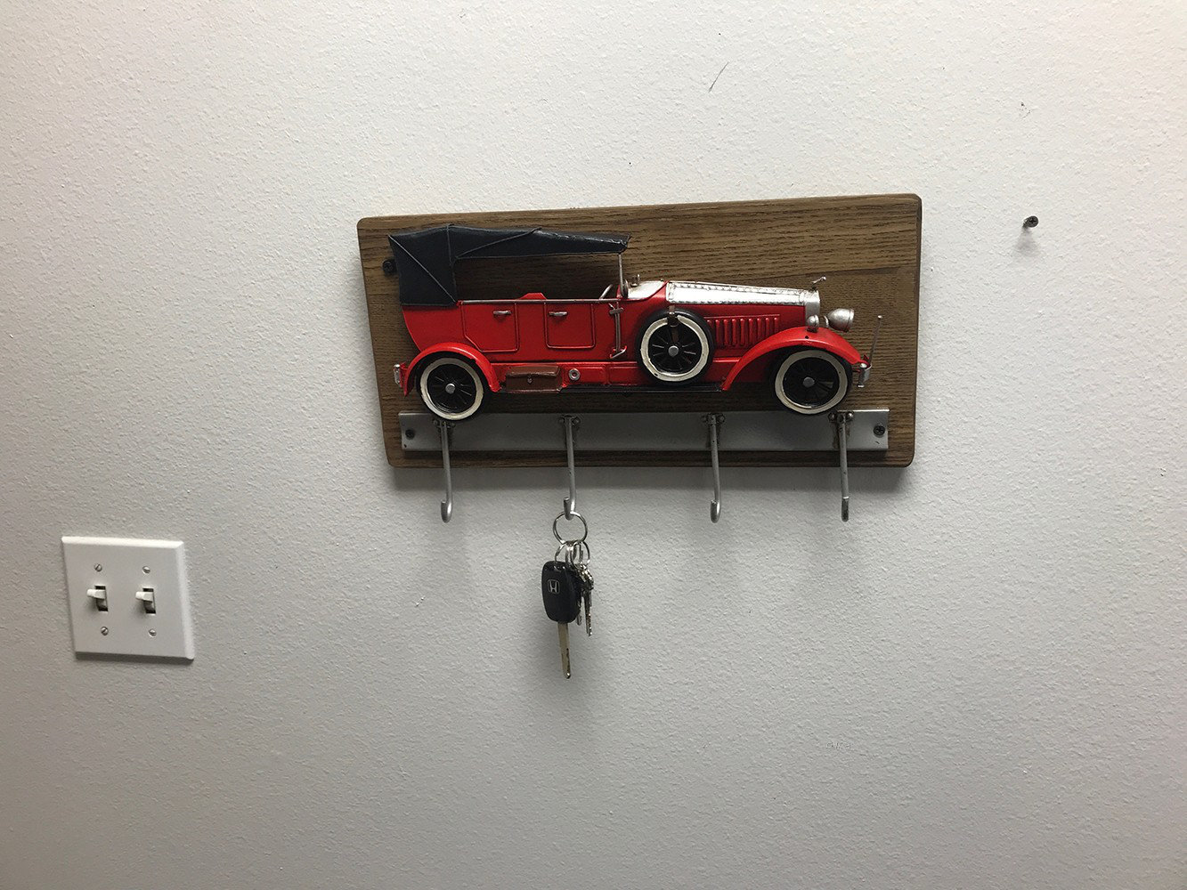 17 Stories Paula Metal Wall 4 - Hook Wall Mounted Coat Rack | Wayfair