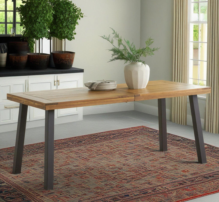 Ophelia & Co. A wood dining table that has a natural stain and rustic ...