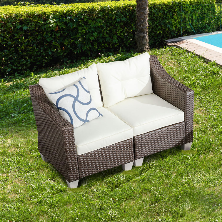 Winston Porter Outdoor Wicker Loveseat With White Cushions | Wayfair