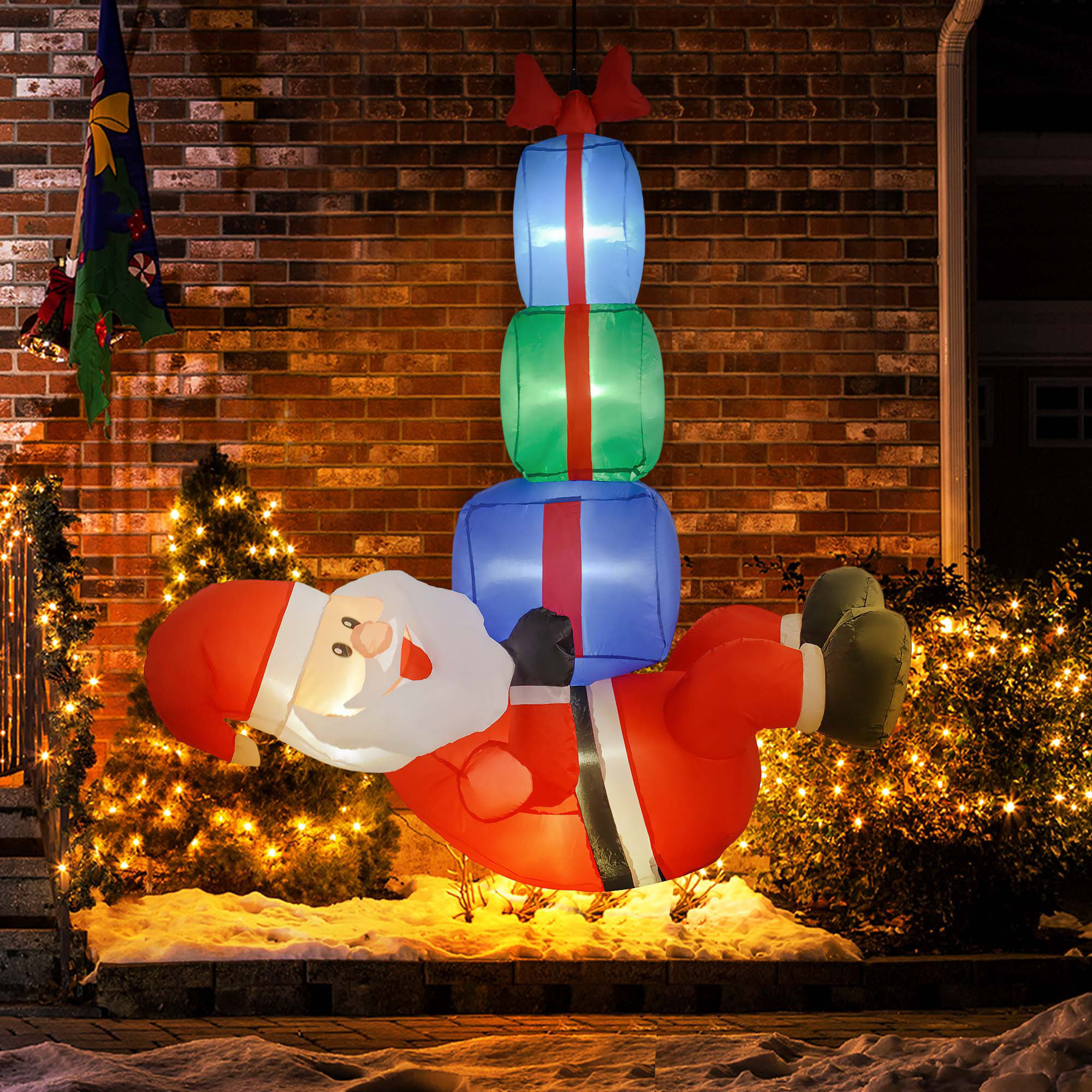 Alcott Hill Christmas Inflatables Santa Claus Hanging Under Three Gift ...