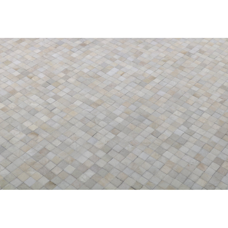 Orren Ellis Meer Patchwork Handmade Cow Skin Ivory Area Rug | Wayfair