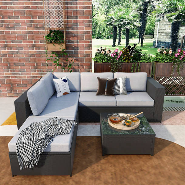 Orren Ellis Ahull 5 Piece Rattan Sectional Seating Group with Cushions ...