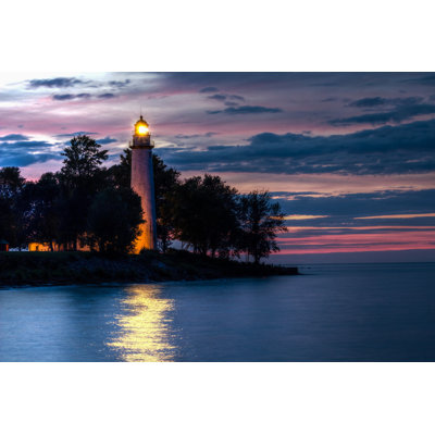 Breakwater Bay Lighthouse Glowing by Ehrlif - Wrapped Canvas Photograph ...