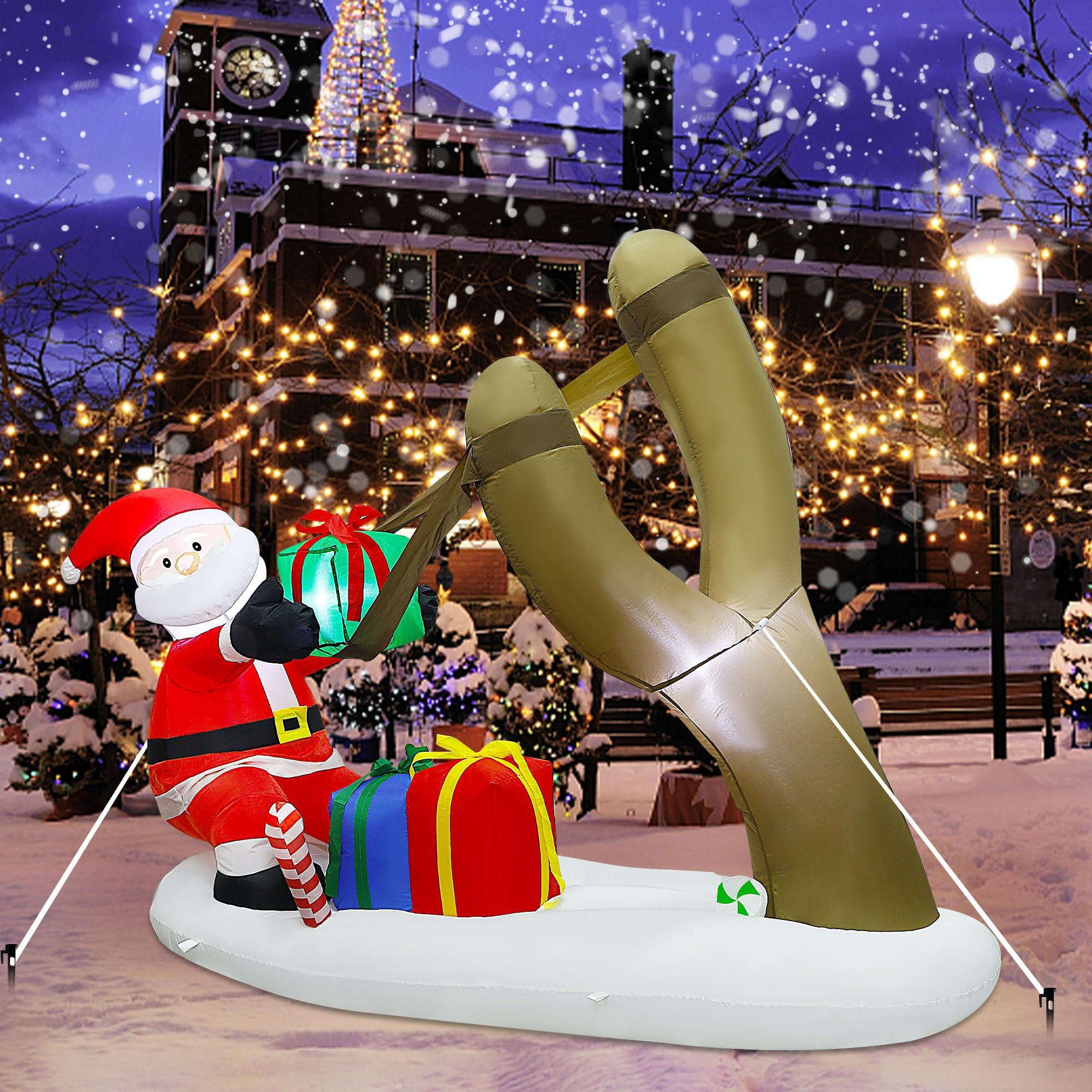 The Holiday Aisle® 6.9FT Inflatable Santa with Gifts & Slingshot for ...