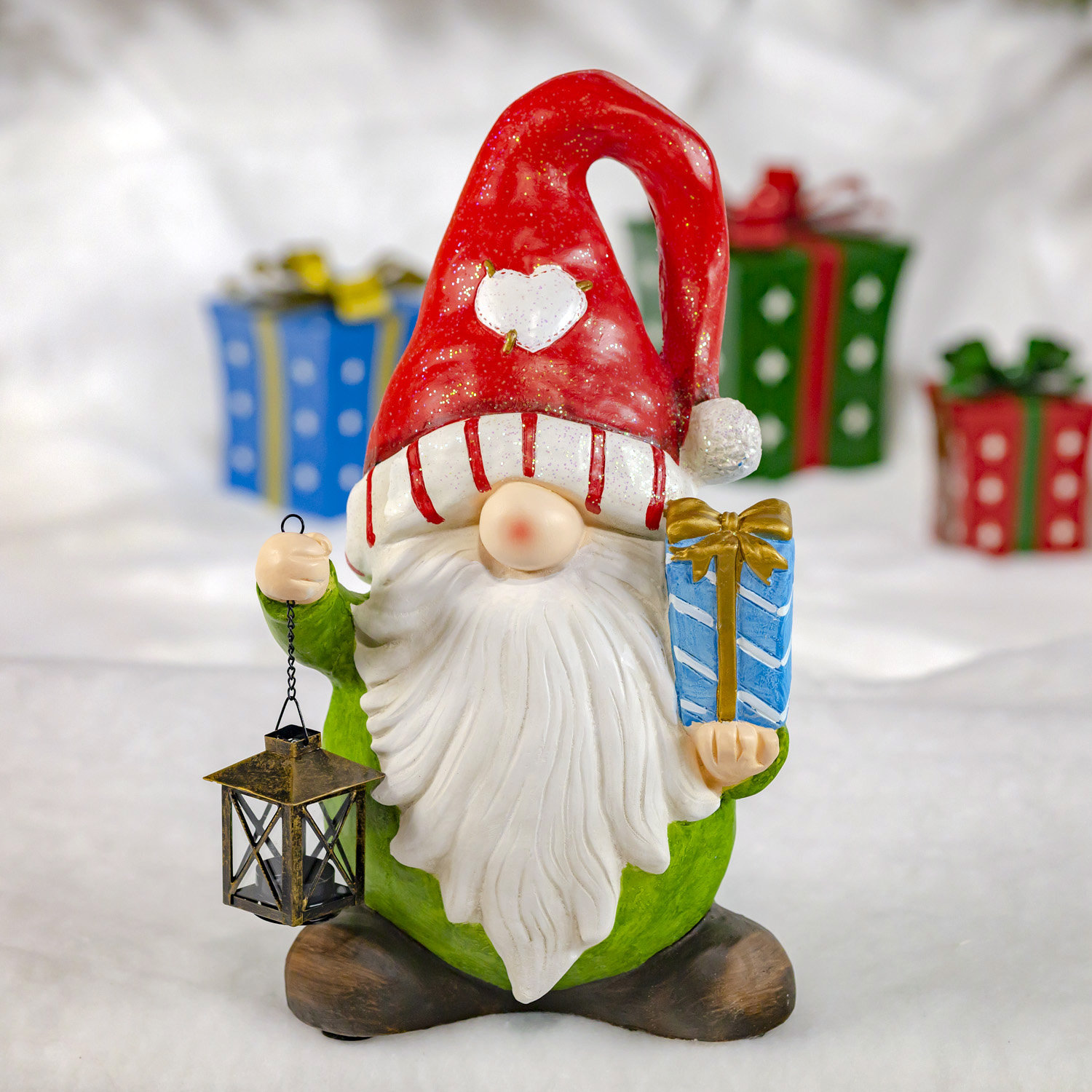 The Holiday Aisle® Christmas Garden Gnome Holding Gift with Red Heart ...