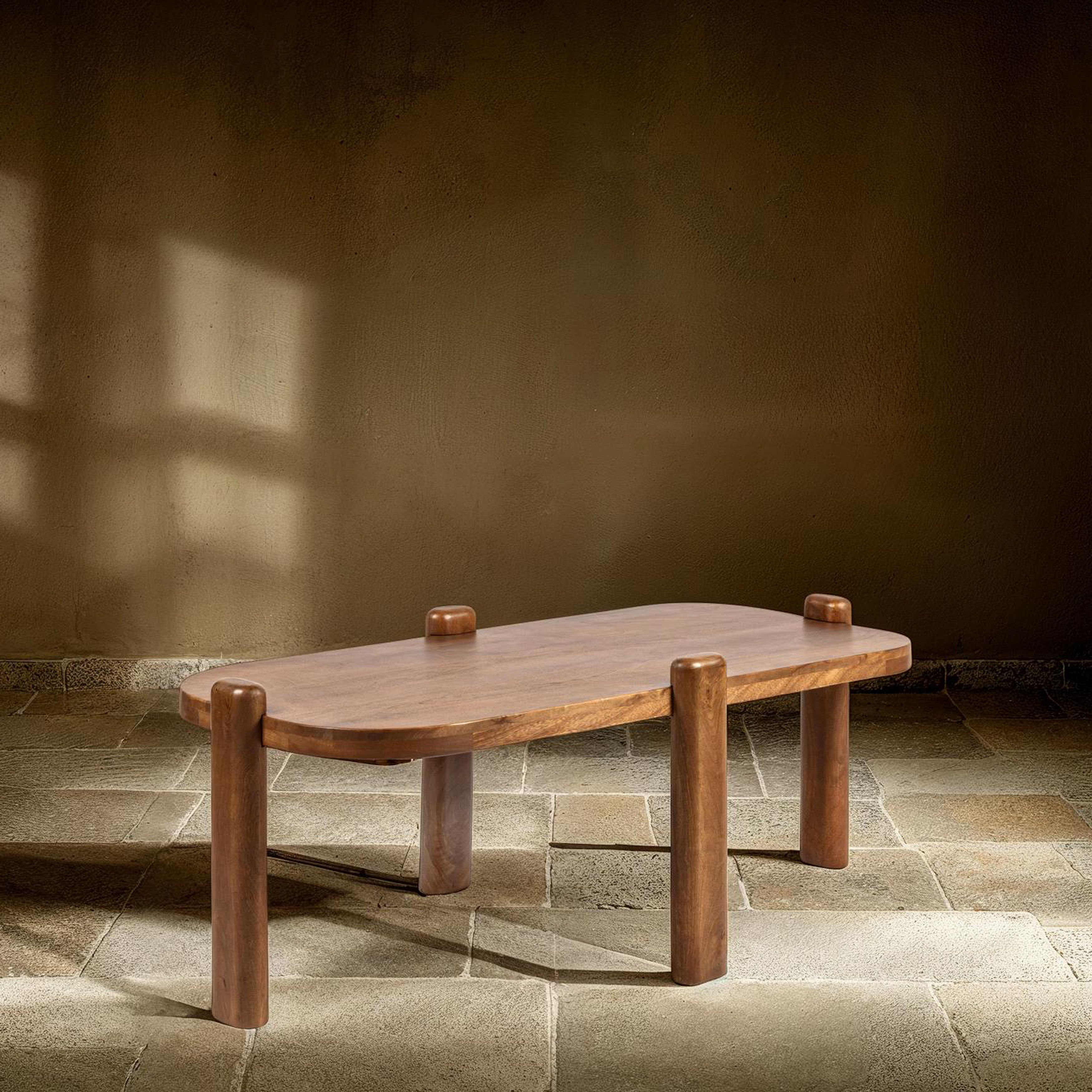 Rowena Interiors Curz Pill-Shaped Mango Wood Coffee Table | Wayfair