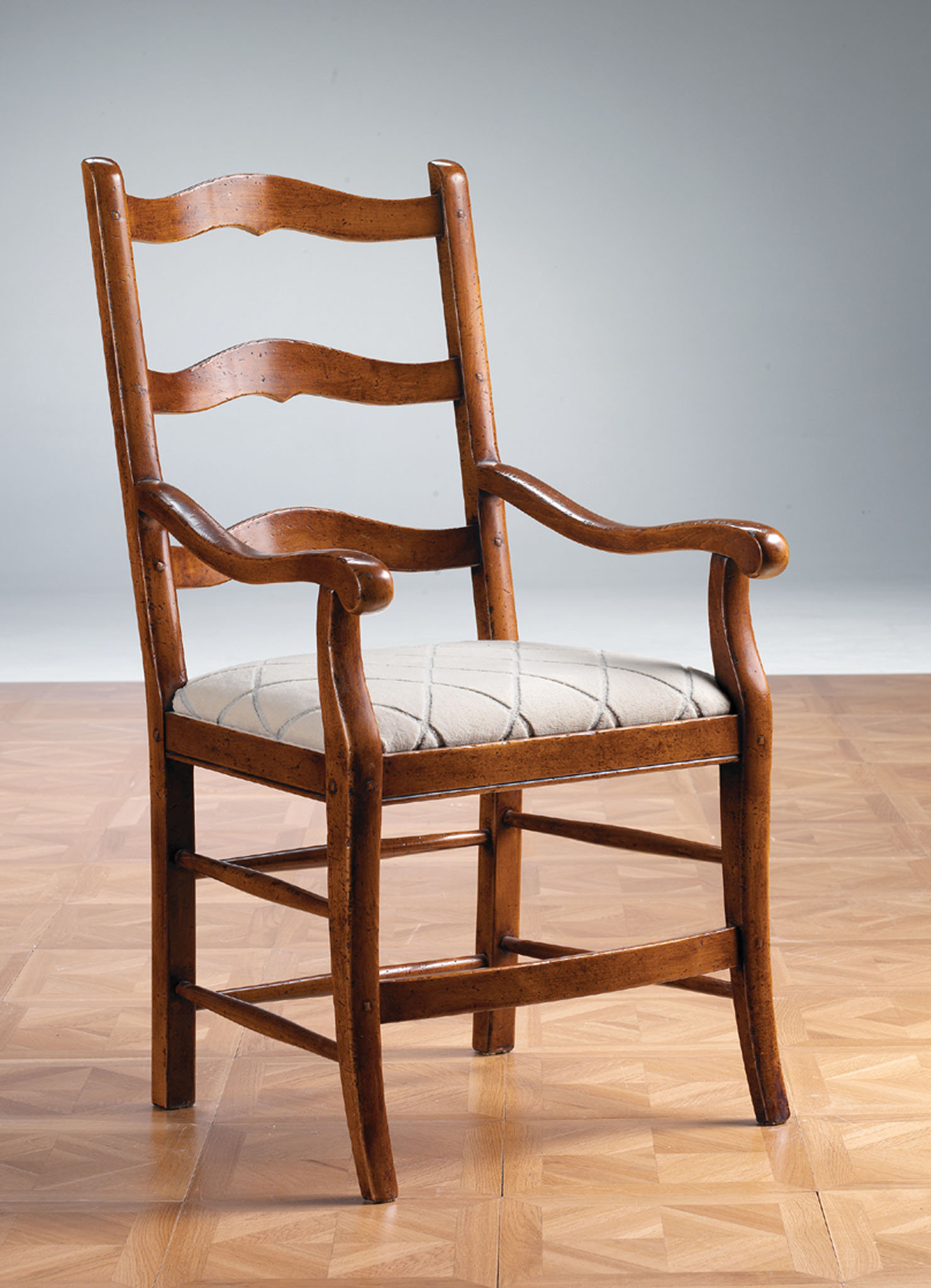 David Michael Upholstered Ladder Back Arm Chair in Brown | Wayfair